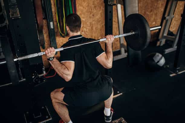 Low Bar or High Bar Squat Variation: Which is Better? - British ...